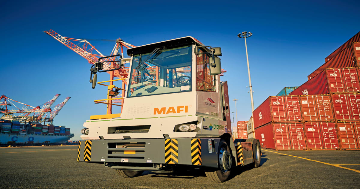 Propane Port Tractor with Shipping Containers | PERC